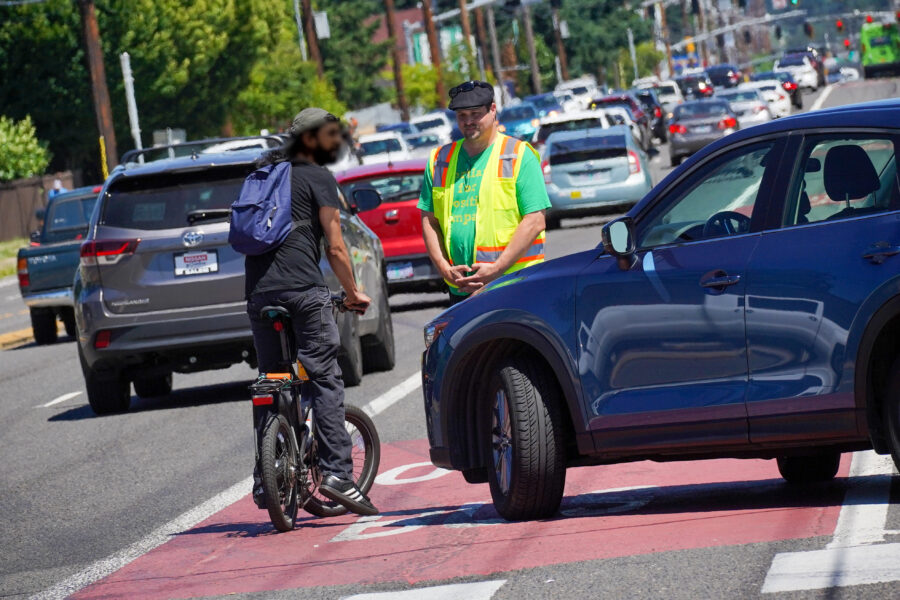 Protestor blocks bus and bike lanes on Division with his car – BikePortland