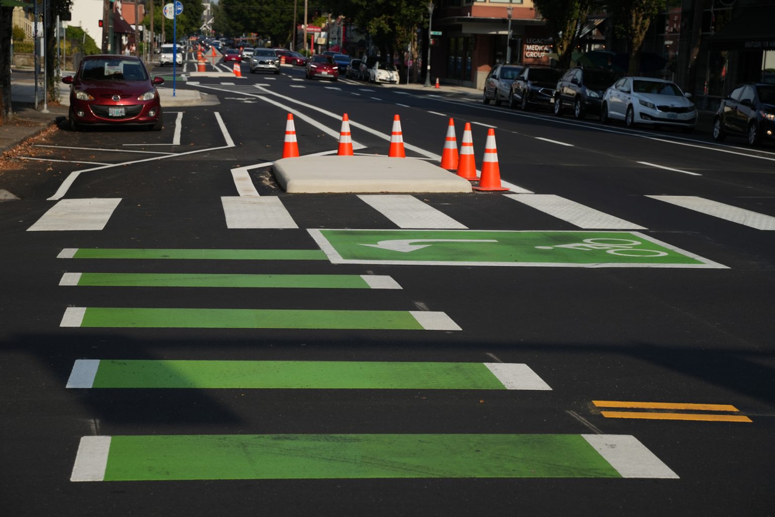 First look at new bike lane — and one less car lane! — on NE Broadway ...